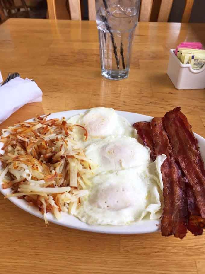 Hash browns with a golden crust, eggs cooked just right, and bacon that actually tastes like bacon—simple perfection executed beautifully.