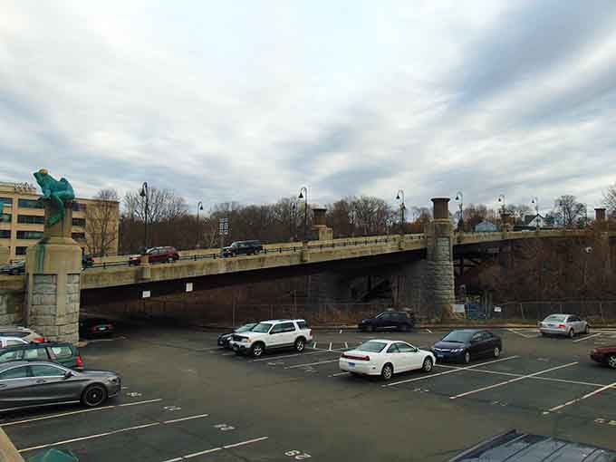 Just another Tuesday in Willimantic, where parking lots offer premium views of monumental amphibians.