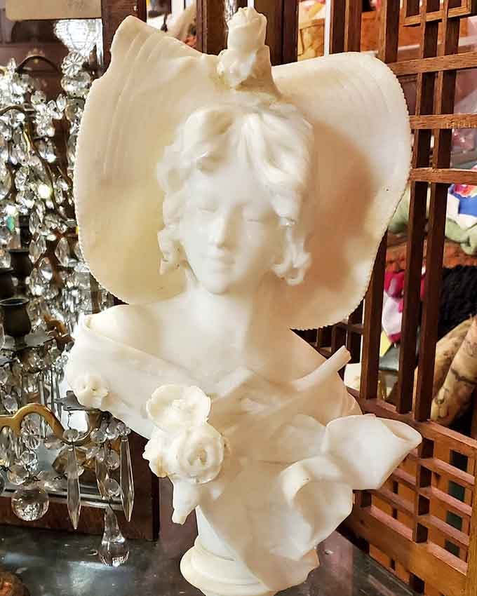 This alabaster beauty has been waiting decades to grace someone's mantelpiece with her timeless, elegant presence.