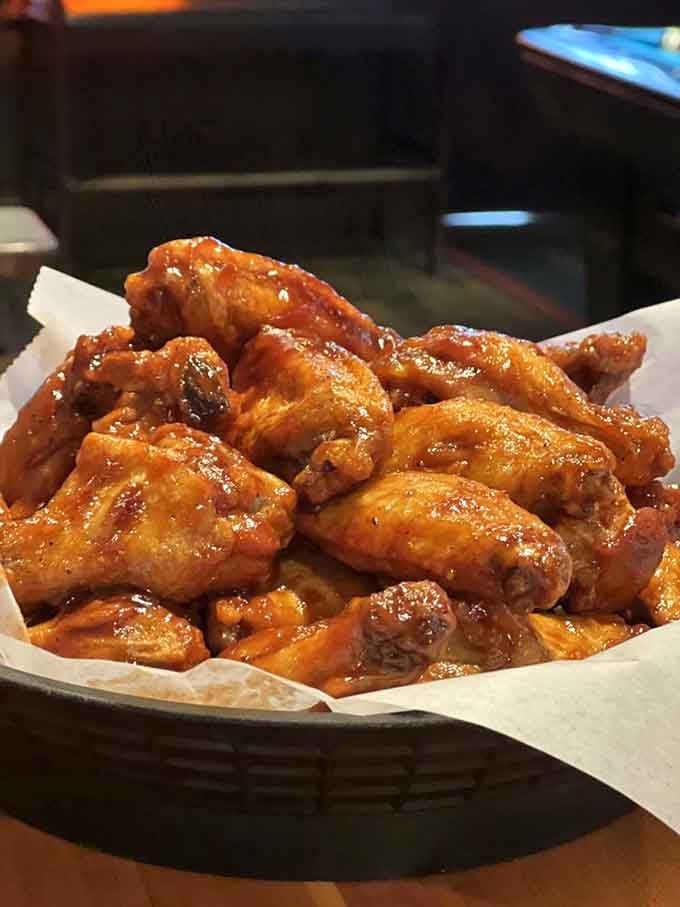 Wings glazed to perfection, the kind that make you forget napkins exist until it's too late.