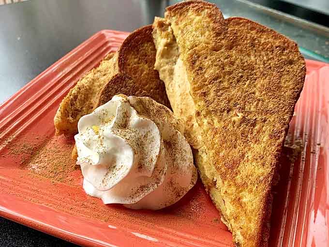 French toast so perfectly golden it practically glows, proving that sometimes the classics don't need improving, just proper execution.