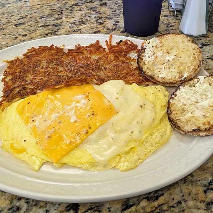 That omelet's fluffier than a cloud, and those hash browns achieved the golden-brown crispiness we all dream about but rarely achieve.