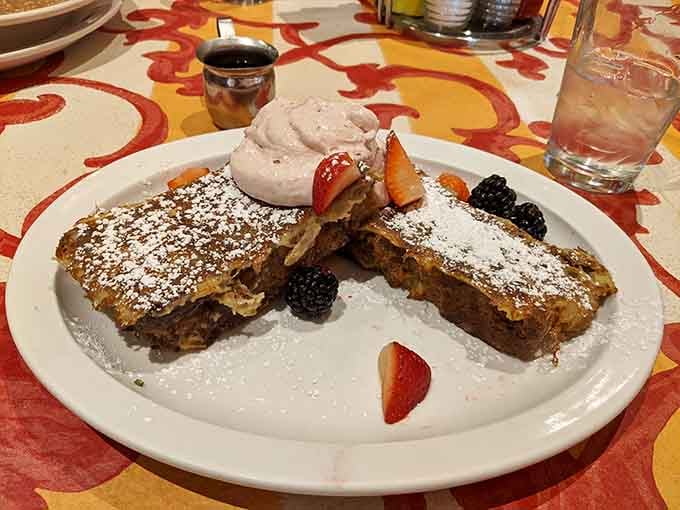 French toast dusted with powdered sugar and crowned with berries&mdash;breakfast royalty has officially arrived at your table.