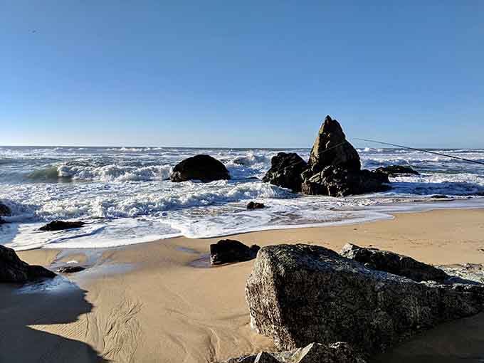 Dramatic rocks rising from foaming surf like ancient sculptures placed by a very artistic ocean.