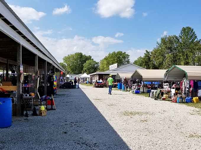 The outdoor vendor stretch where covered stalls protect treasures and shoppers alike from Missouri's ever-changing moods.
