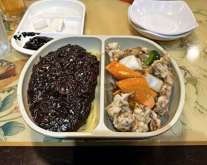 The dynamic duo: crispy tangsuyuk meets silky jajangmyeon. Why choose when you can have both masterpieces?