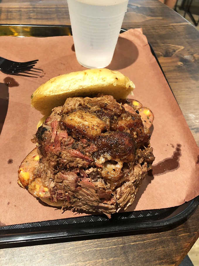 This towering sandwich situation requires both hands, a big appetite, and possibly a structural engineer's approval.