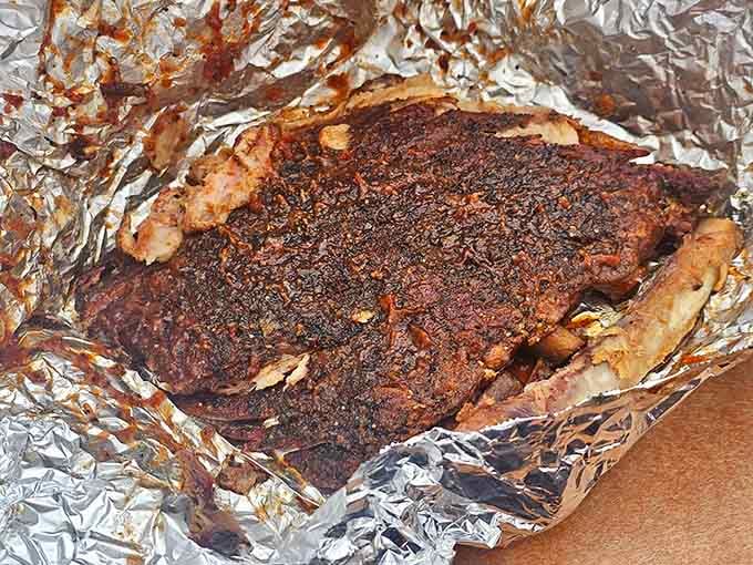 That mahogany bark and smoke ring tell you everything about the hours of love these ribs received.