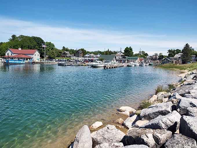 The calm harbor waters mirror the buildings perfectly, doubling your dose of historic beauty in one view.