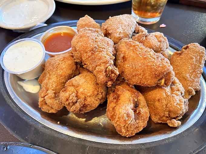 A platter of fried chicken pieces that could make a vegetarian seriously reconsider their life choices, honestly.