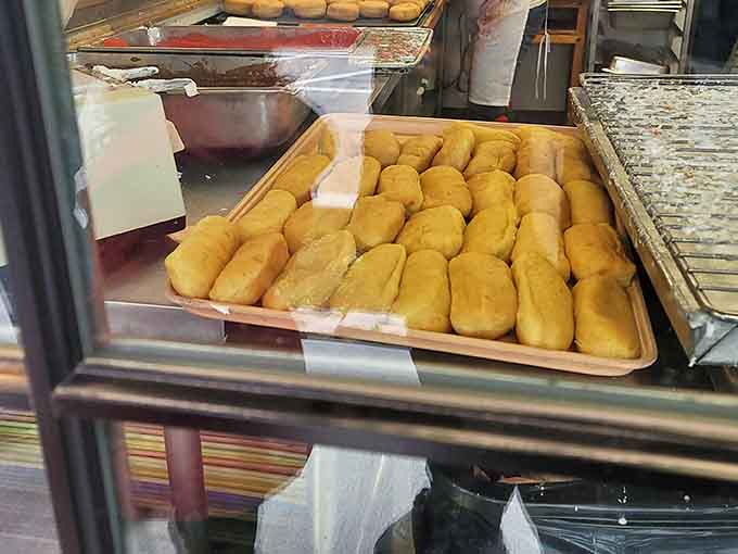 Those eclairs are basically fancy donuts in formal wear, dressed up and ready to impress your taste buds at the party.