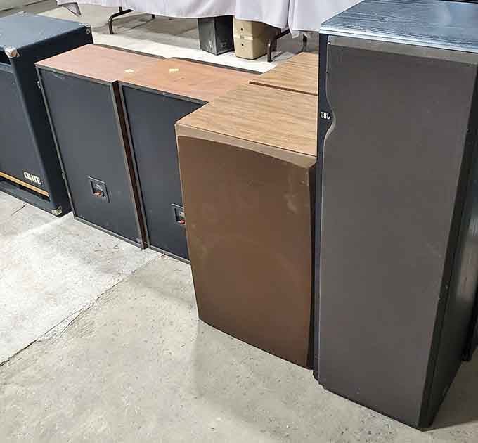 Vintage speakers line up like soldiers from the analog wars, ready to make your living room sound incredible again.