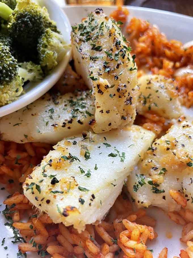 Chilean sea bass over rice with broccoli: proof that simple preparations let quality seafood shine brightest.