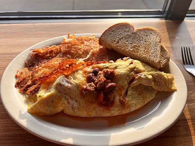 Chili on an omelet is the kind of bold breakfast move that separates the timid from the triumphant.