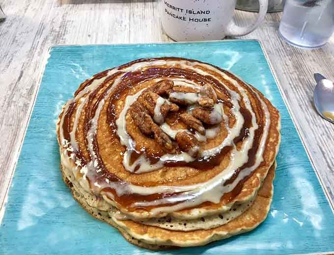 That cinnamon roll pancake spiral is hypnotic, like a delicious vortex pulling you into pure breakfast bliss.