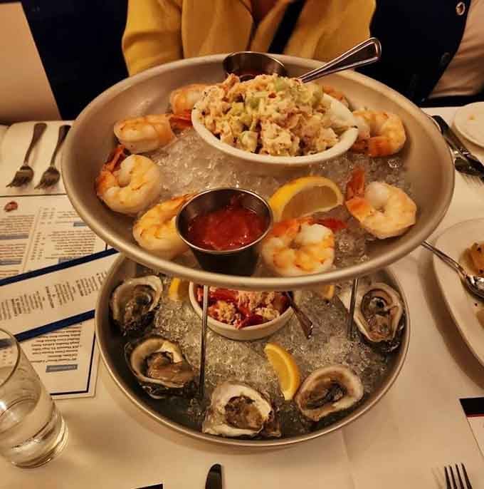 A seafood tower that looks like it sailed straight from the ocean to your table via first-class accommodations.