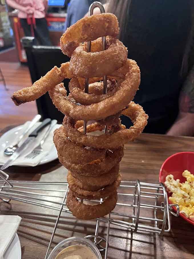 Onion rings standing at attention like the Leaning Tower of Pisa, but crunchier and more delicious.