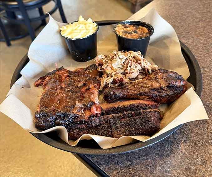 This platter of ribs, brisket, and pulled pork is basically a greatest hits album, but for your taste buds.