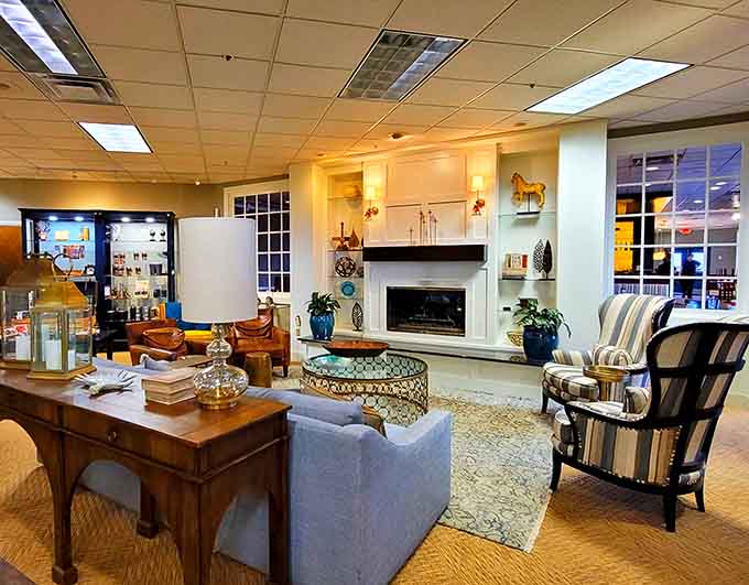 A cozy reading nook with a fireplace that makes you want to cancel all your plans indefinitely.