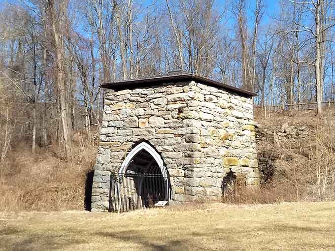 This stone building stands quietly in the woods, holding stories older than your great-grandparents' wedding photos combined together.