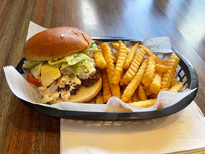 Behold the legendary Olive Burger, topped with tangy olive sauce that'll convert skeptics faster than you can say "another one, please."
