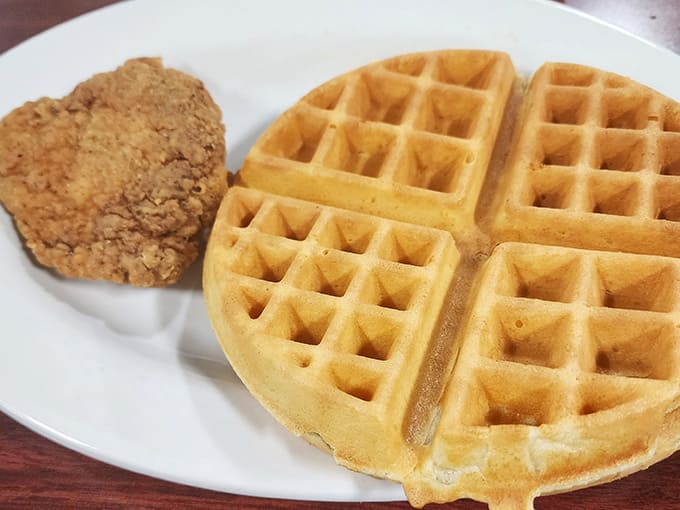 Golden waffles paired with fried chicken prove that some food combinations are simply too good to question or resist.