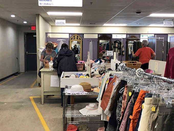 The women's clothing section offers organized racks where patient shoppers discover designer labels hiding among everyday brands.