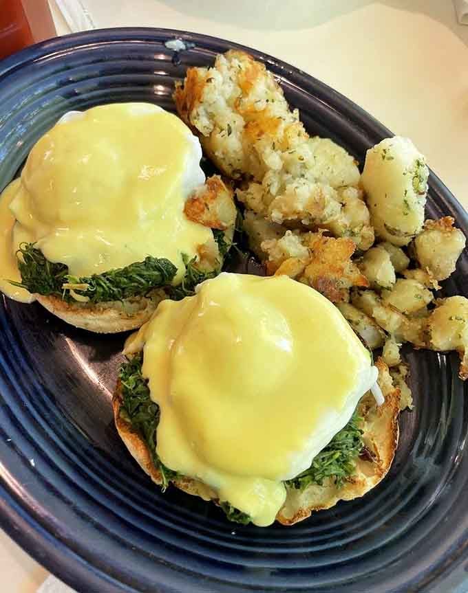 Eggs Florentine with hollandaise that cascades like liquid gold over perfectly poached eggs and garlicky spinach&mdash;brunch goals achieved.