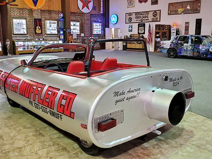 Someone turned a muffler into a drivable statement piece, proving car enthusiasts have the best sense of humor.