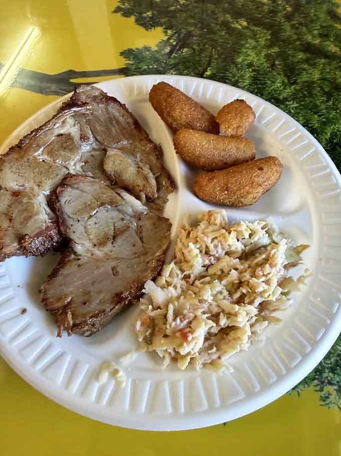 Sliced BBQ with hushpuppies and slaw proves North Carolina knows how to treat pork with proper respect and affection.