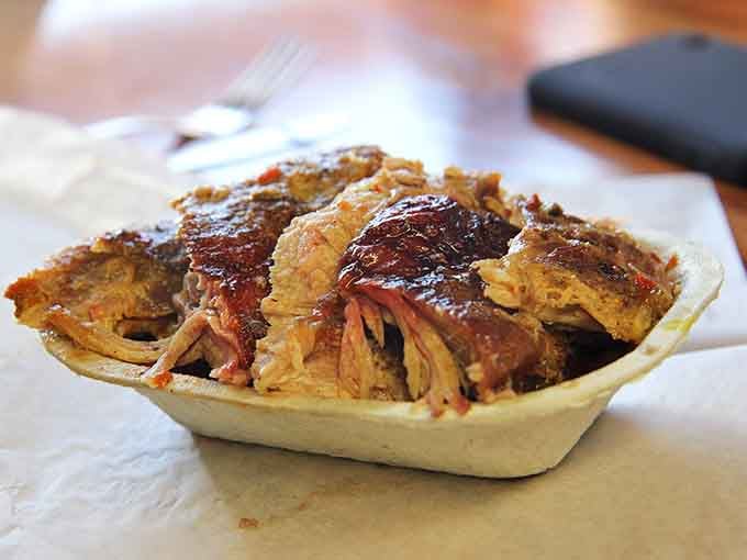 Sliced pork and red slaw together create the kind of harmony that would make Simon and Garfunkel jealous.