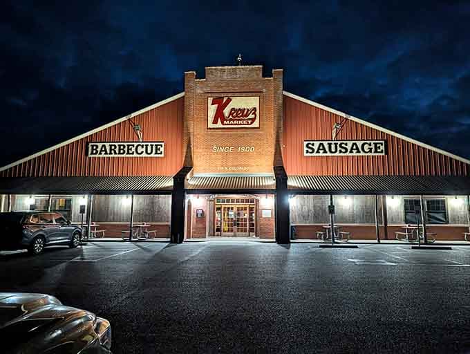 Kreuz Market at night looks like a barbecue spaceship that landed in Texas and decided to stay forever.