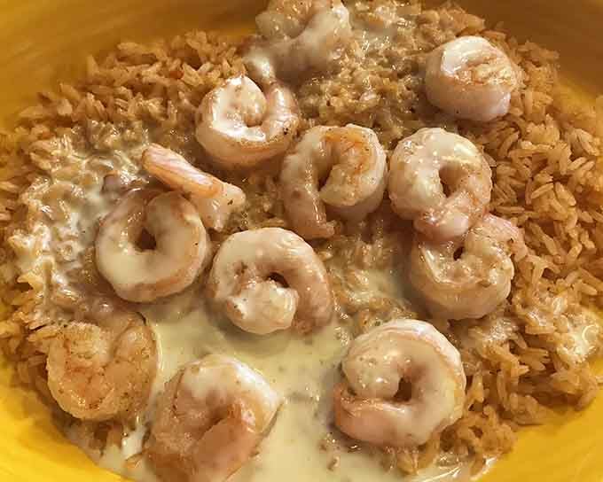 Shrimp swimming in creamy sauce over a bed of rice proves that seafood belongs in landlocked Indiana just as much as anywhere.