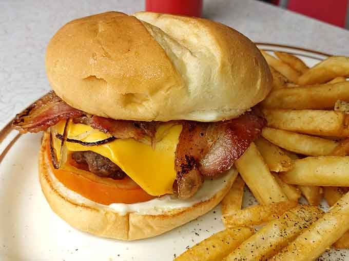 A juicy bacon cheeseburger with crispy fries is the kind of meal that makes everything else seem unimportant.