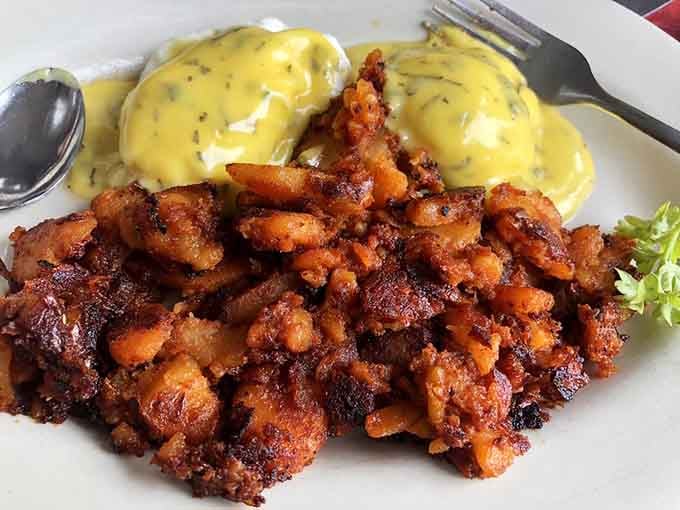 Poached eggs and crispy potatoes team up for a breakfast plate that takes "good morning" to new heights.