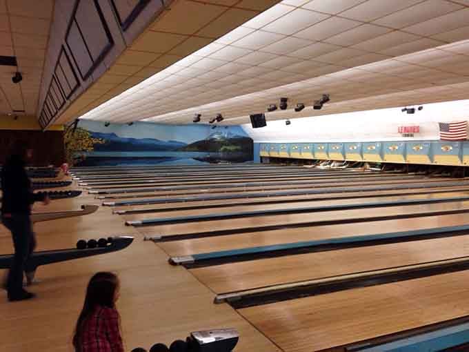 The view that greets you: wooden lanes stretching toward possibility, framed by colors that time forgot to fade.