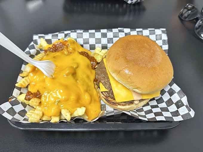 When cheese sauce flows like lava over crispy fries, you've officially entered the no-turning-back zone of deliciousness.