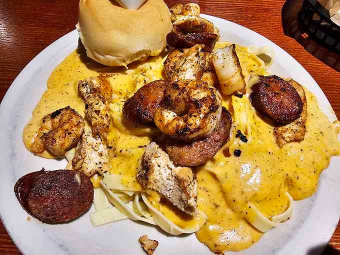 Cajun shrimp and sausage swimming in creamy alfredo sauce over pasta creates a flavor symphony that deserves a standing ovation.