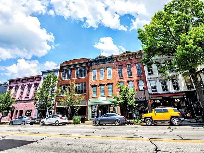 Downtown storefronts wear their colors proudly, like a rainbow decided to settle down and open shop.