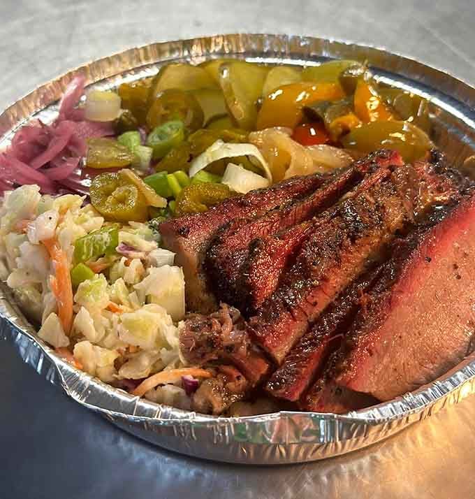 The Kuntry Bumpkin Bowl turns barbecue into an edible work of art, with colors and textures that would make even Grandma Moses reach for a fork.
