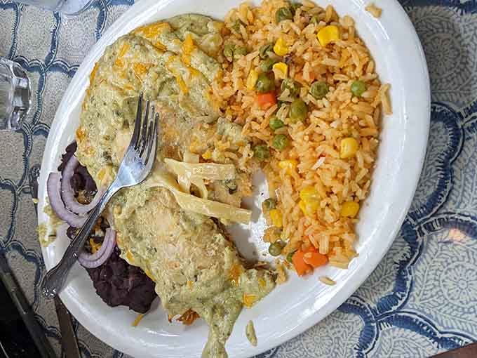 Chicken enchiladas with rice that looks this good proves Magnolia Cafe doesn't play favorites between breakfast and Tex-Mex.