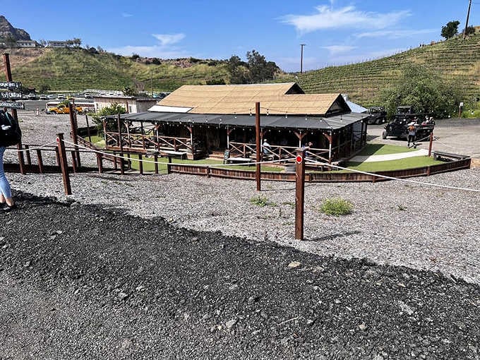 This covered gathering spot is where the magic happens, assuming magic involves wine and good company.