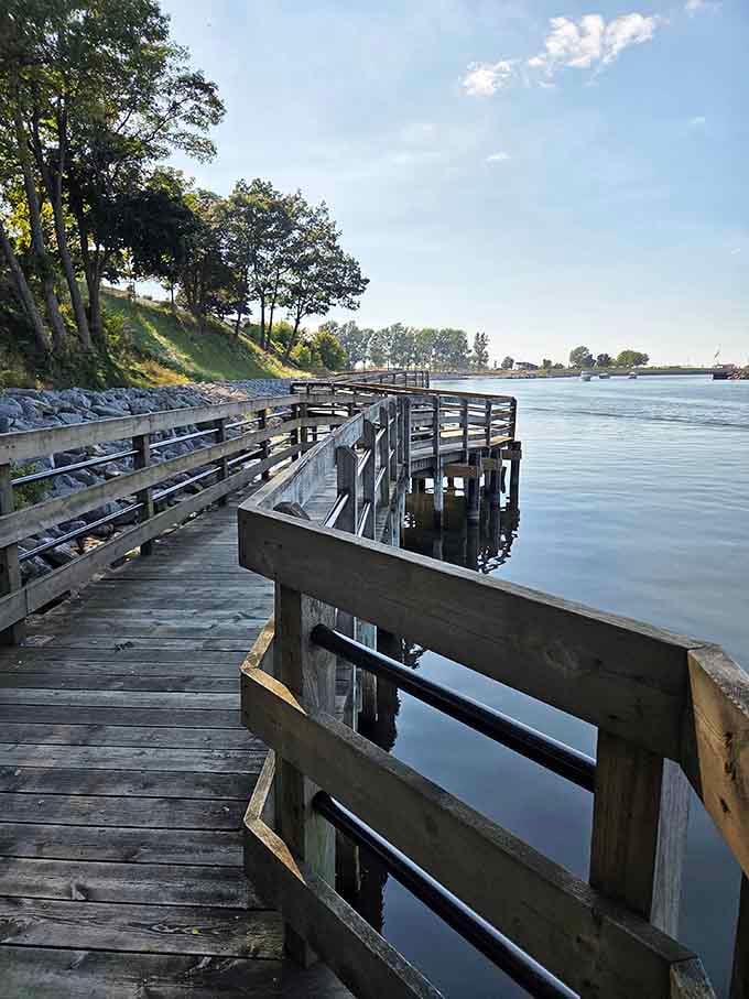 The boardwalk curves along the riverbank, inviting you to slow down and remember what relaxation actually feels like.