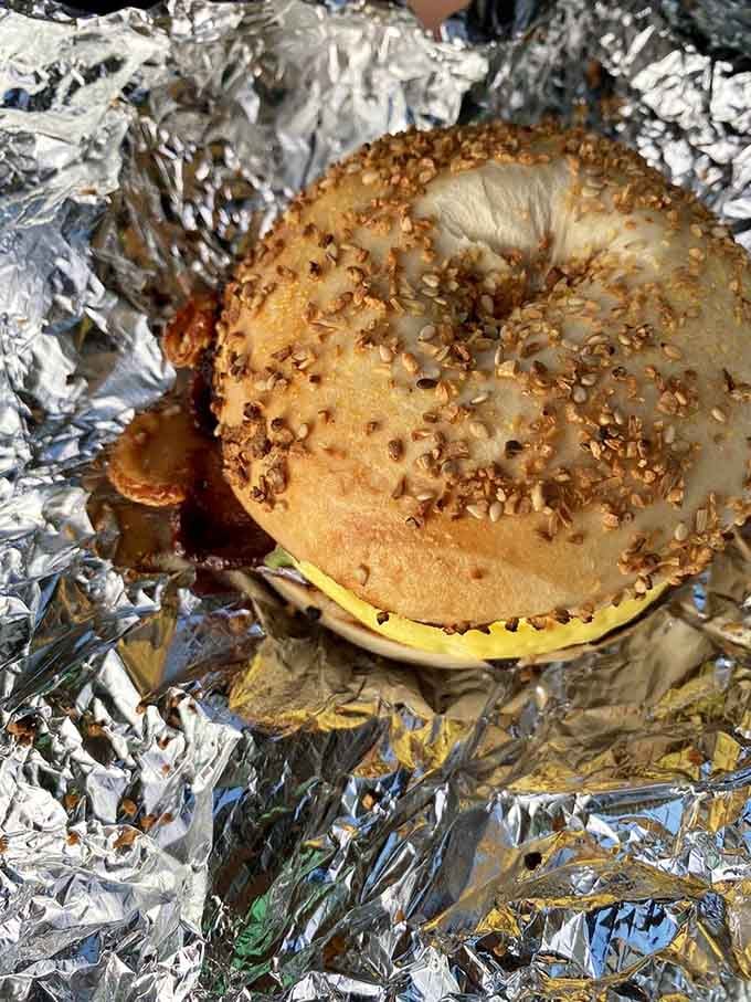 An everything bagel loaded with seeds and spices, proving that more is definitely more when done right.