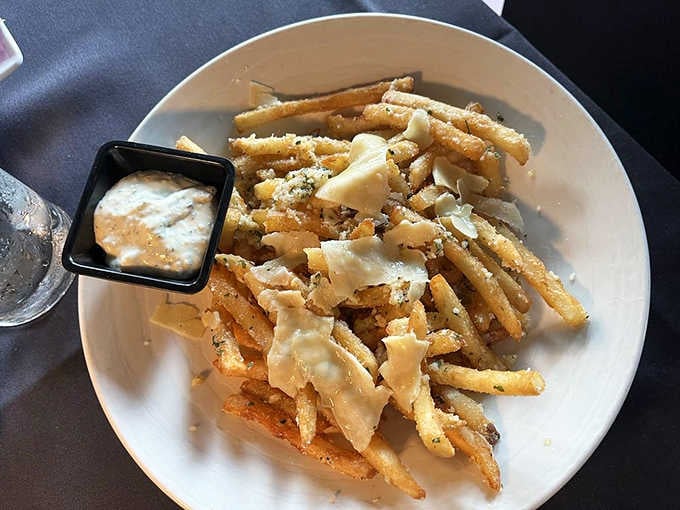 Truffle fries topped with shaved parmesan prove that some indulgences are absolutely worth every single calorie consumed.