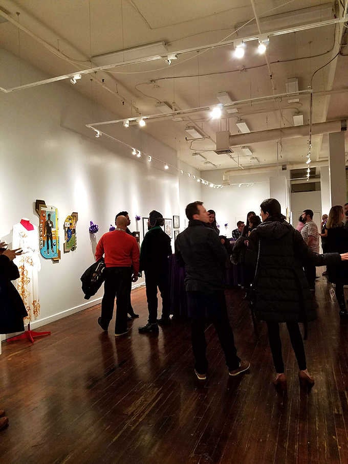 Gallery openings where real people gather to contemplate art, proving culture is alive and thriving in Baltimore.