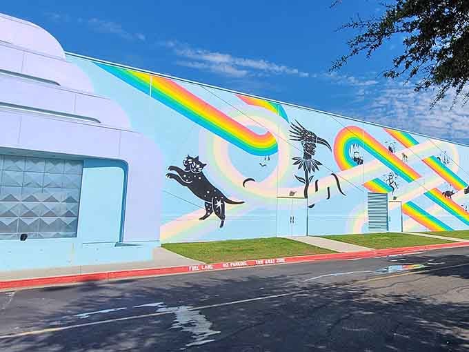 The exterior murals hint at the madness within, like a movie trailer that actually undersells the main feature.