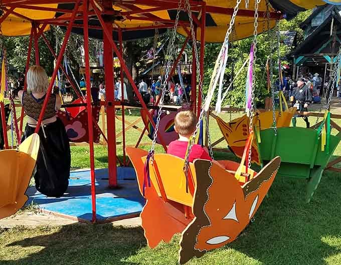 Colorful swings lift children skyward using nothing but human power and Renaissance-era engineering ingenuity.