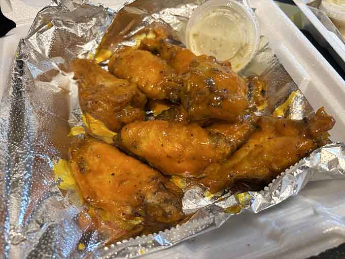Carolina wings glistening with sauce, ready to make your taste buds sing sweeter than a Motown classic.