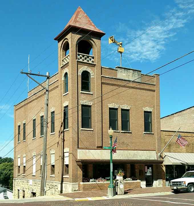 That bell tower has witnessed more town history than any history book could capture, standing proud above the civic heart.